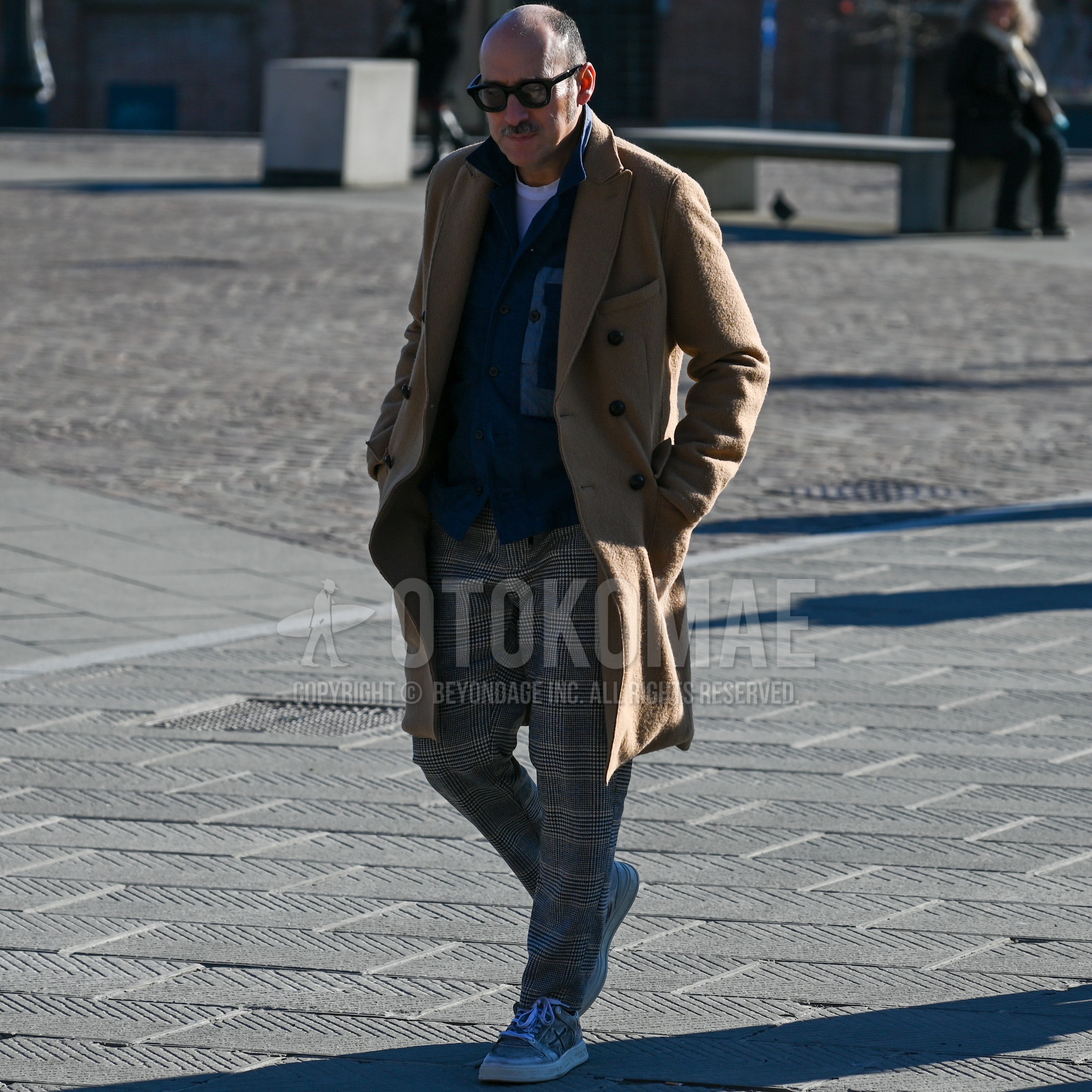 Men's winter outfit with black plain sunglasses, beige plain chester coat, navy plain outerwear ...